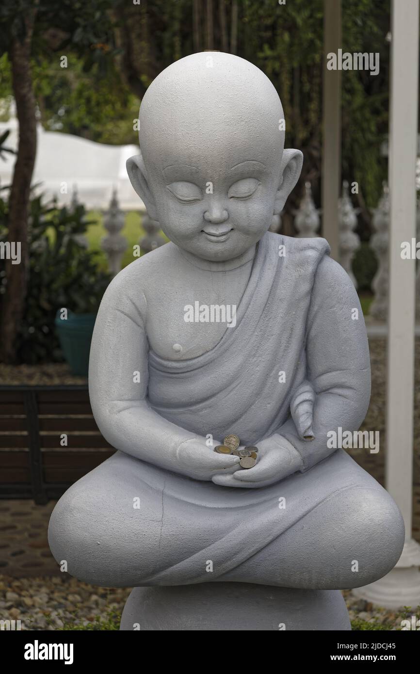 Chiang Rai province, Thailand. 17th May, 2022. Monk statue of wisdom in ...