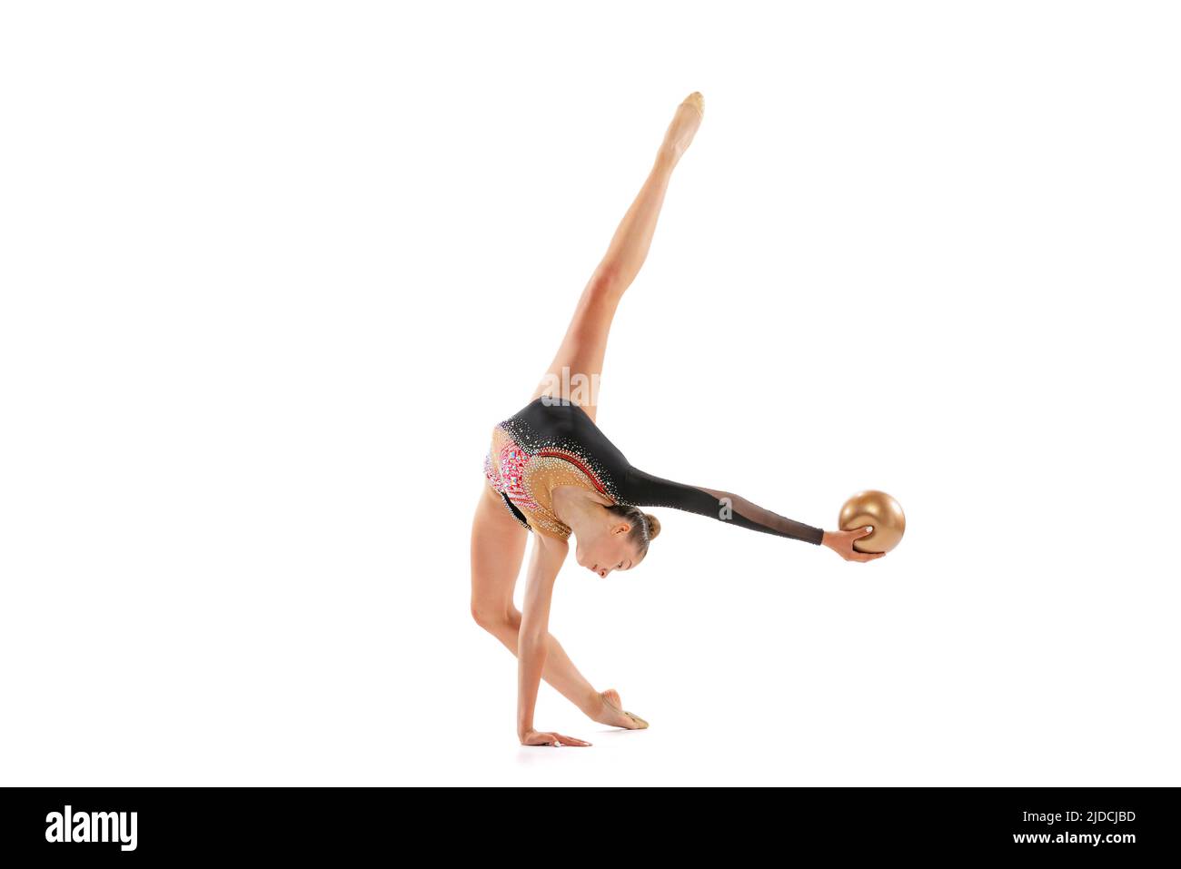 Dynamic portrait of young professional rhythmic gymnastics artist ...