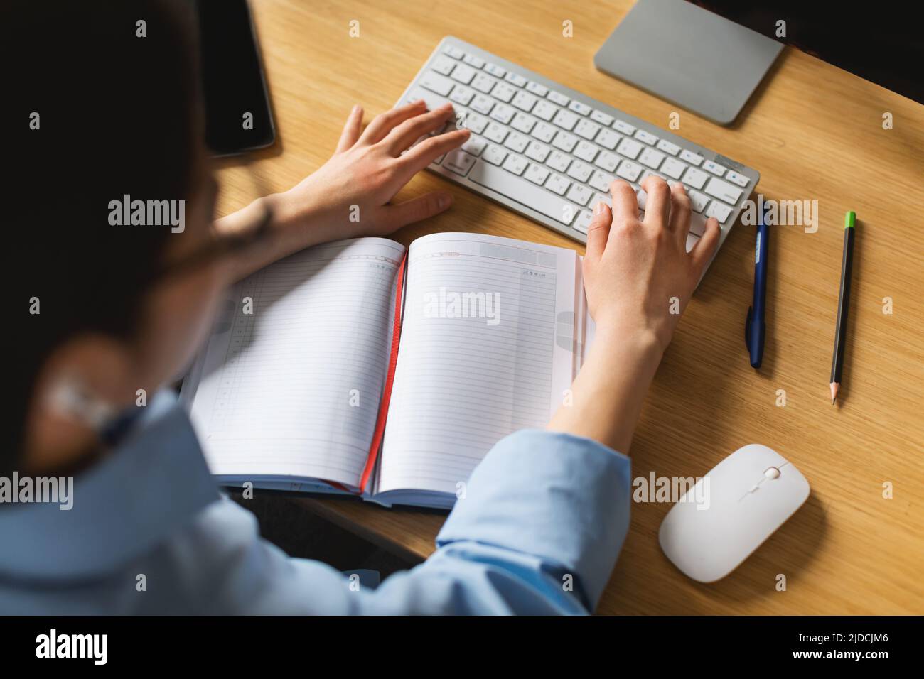 Unrecognizable Japanese Lady Using Computer Keyboard Typing In Modern ...