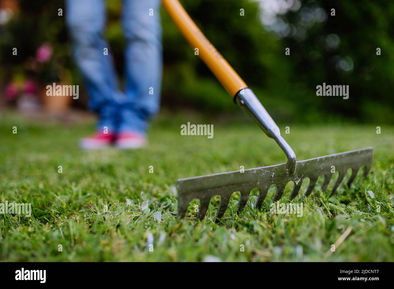 Farmer raking grass hi-res stock photography and images - Alamy