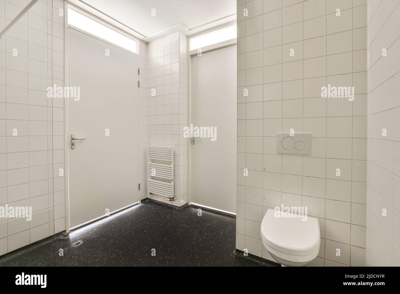 Interior of contemporary bathroom with shower, tiolet and sink in ...