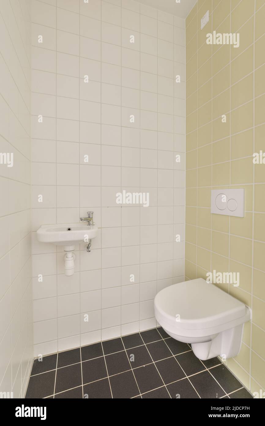 Interior of contemporary bathroom with shower, tiolet and sink in ...