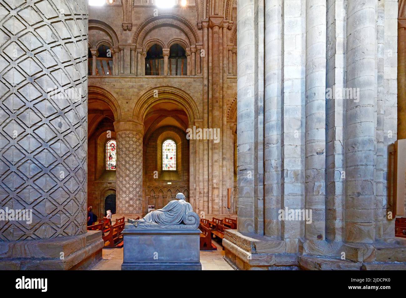 Durham Cathedral ancient walls and carved columns with the main aisle ...