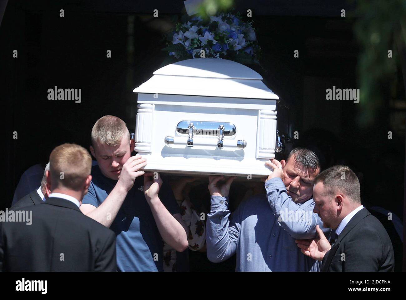 The coffin of Charlie Joyce, nine, is carried out of All Saints Church ...