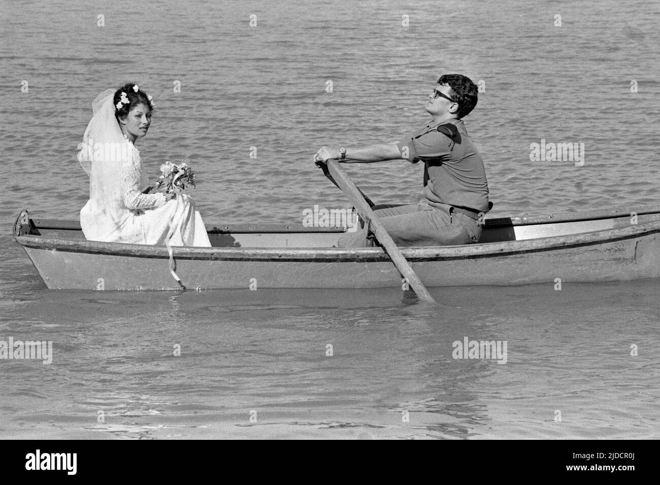 Israel. 06th July, 2020. an Israeli bridal couple sits in a rowing boat ...