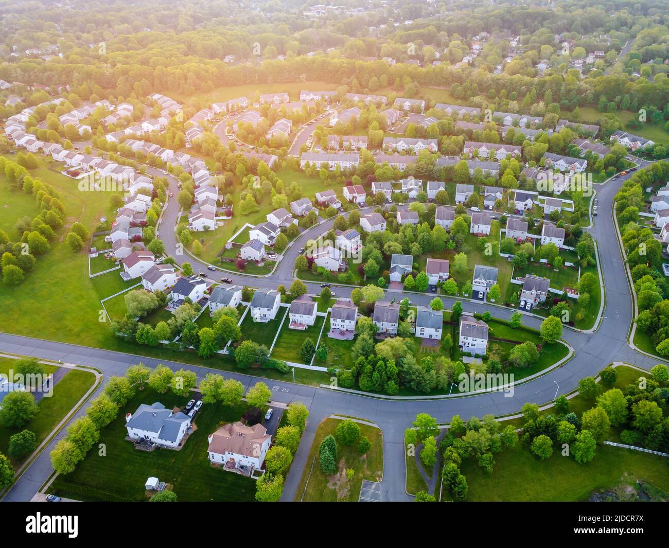 Aerial panorama view of a small town city home roofs at suburban ...