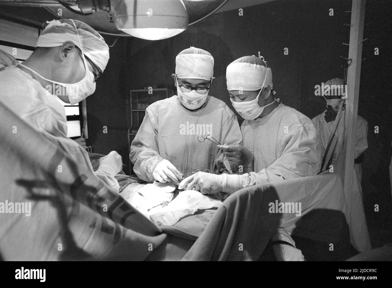Chinese doctors during an operation, operating room, medicine, hospital ...
