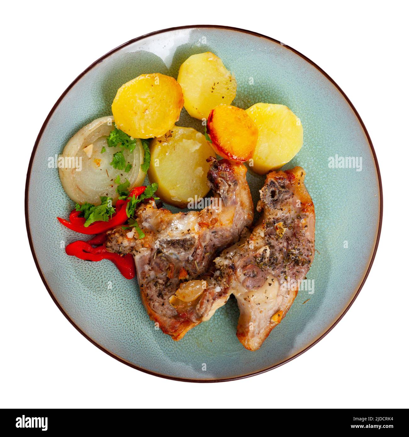 Side dish of baked lamb leg with potatoes and pepper Stock Photo - Alamy