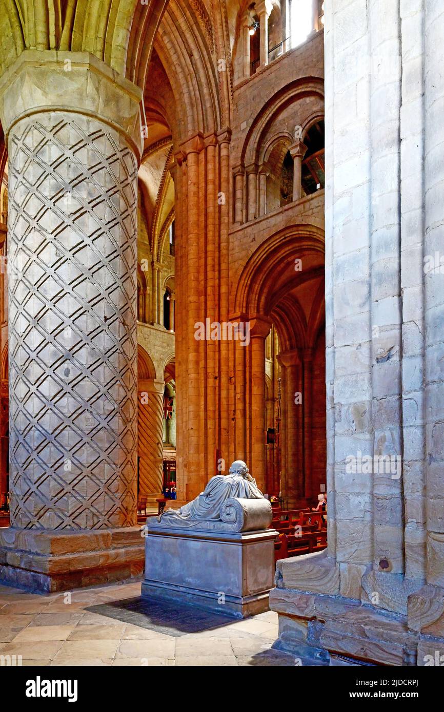 Durham Cathedral ancient walls and carved columns with the main aisle ...