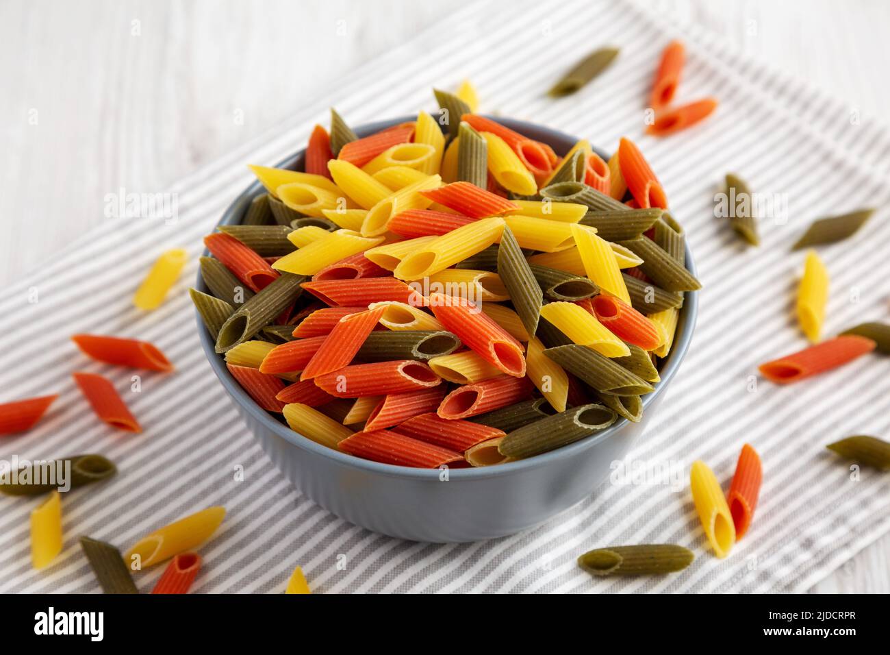 Durum Wheat Semolina Pasta with Tomato and Spinach in a Bowl, side view ...