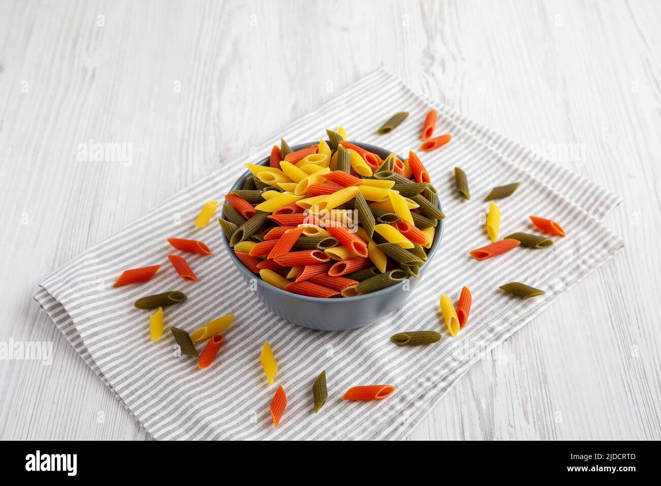 Durum Wheat Semolina Pasta with Tomato and Spinach in a Bowl, side view ...