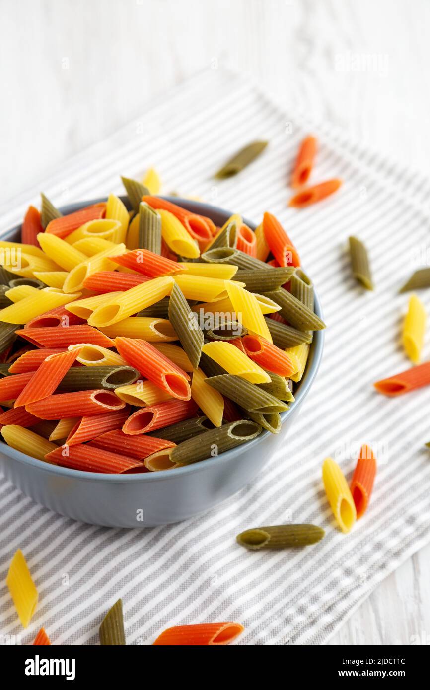 Durum Wheat Semolina Pasta with Tomato and Spinach in a Bowl, side view ...