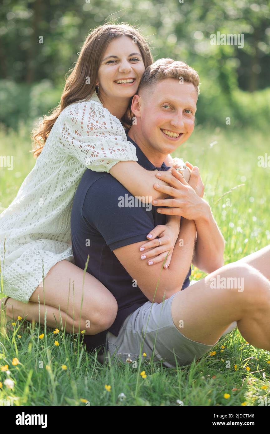 Affectionate man embracing attractive hi-res stock photography and ...