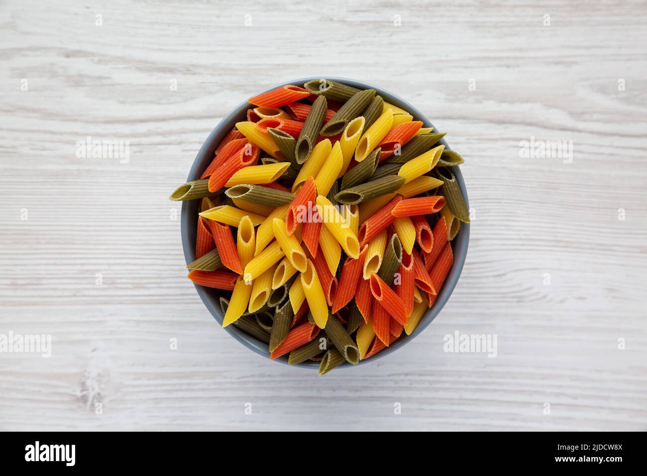 Durum Wheat Semolina Pasta with Tomato and Spinach in a Bowl, top view ...