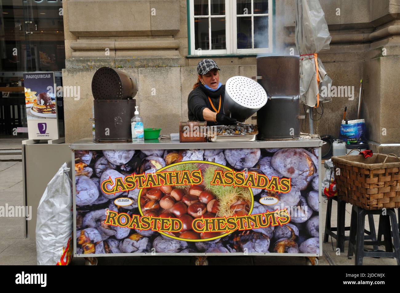 Hot chestnut stall in market hi-res stock photography and images - Alamy