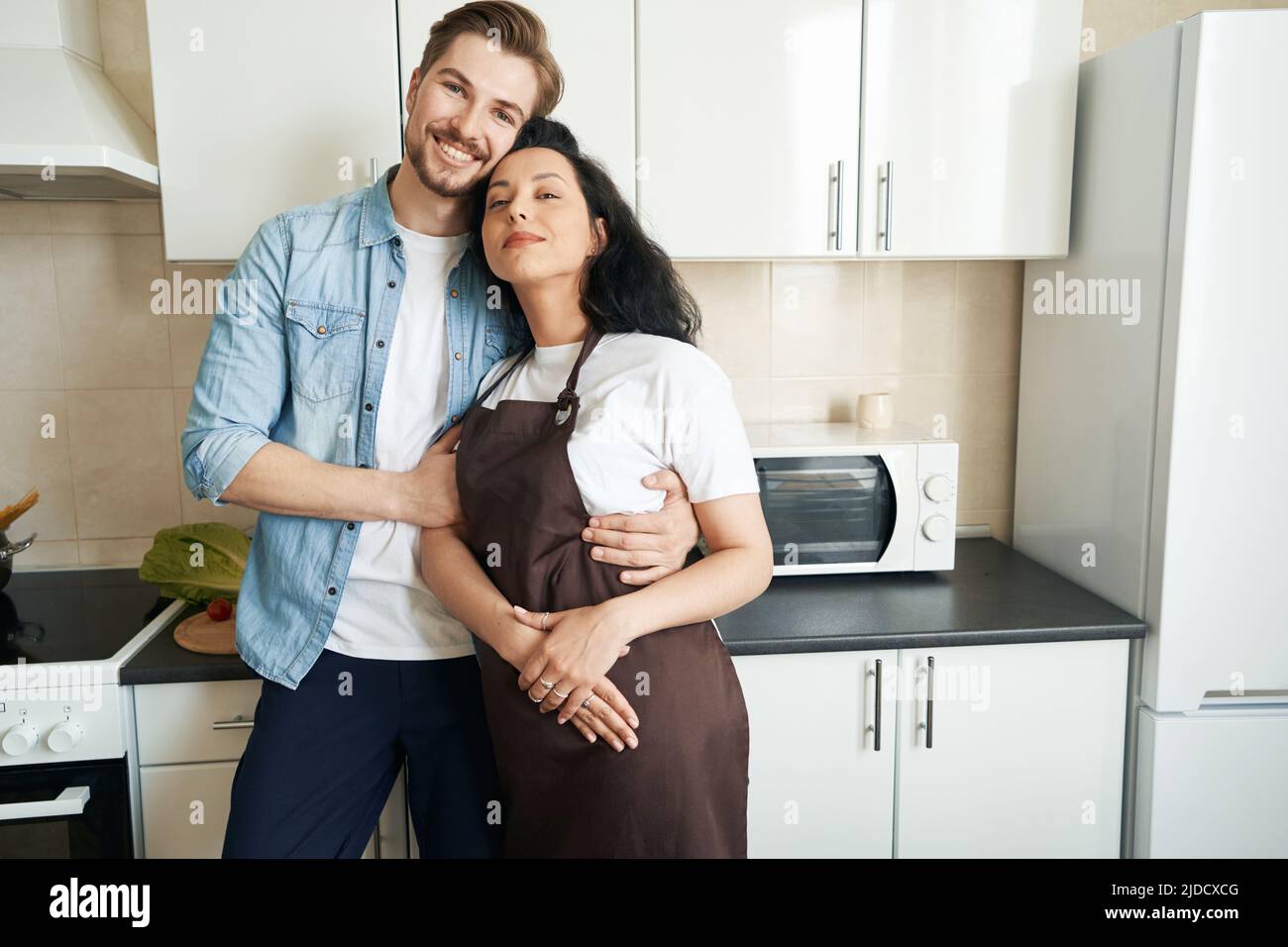 Couple in love stand hi-res stock photography and images - Alamy