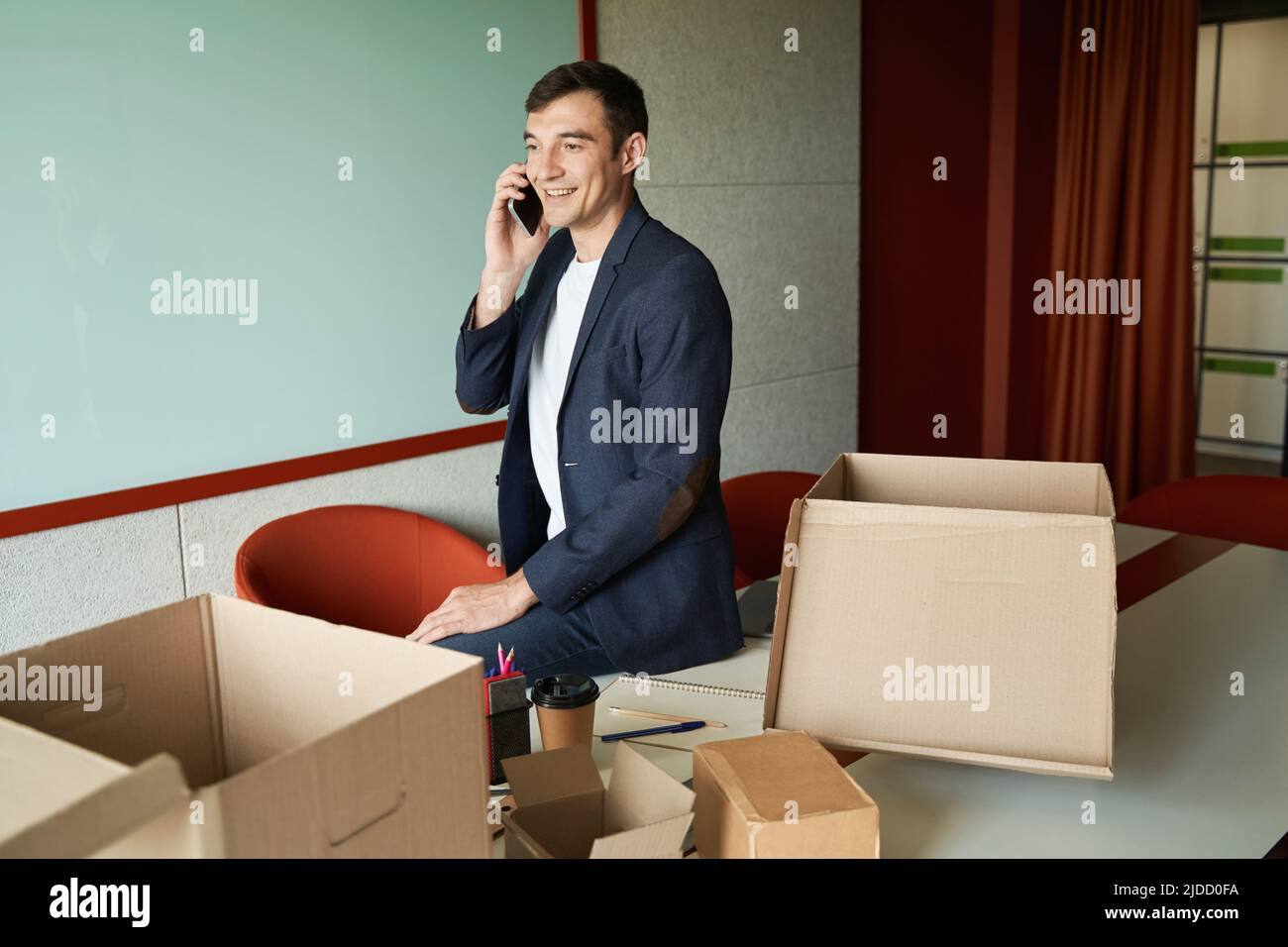 Businessman sitting inside the box hi-res stock photography and images ...
