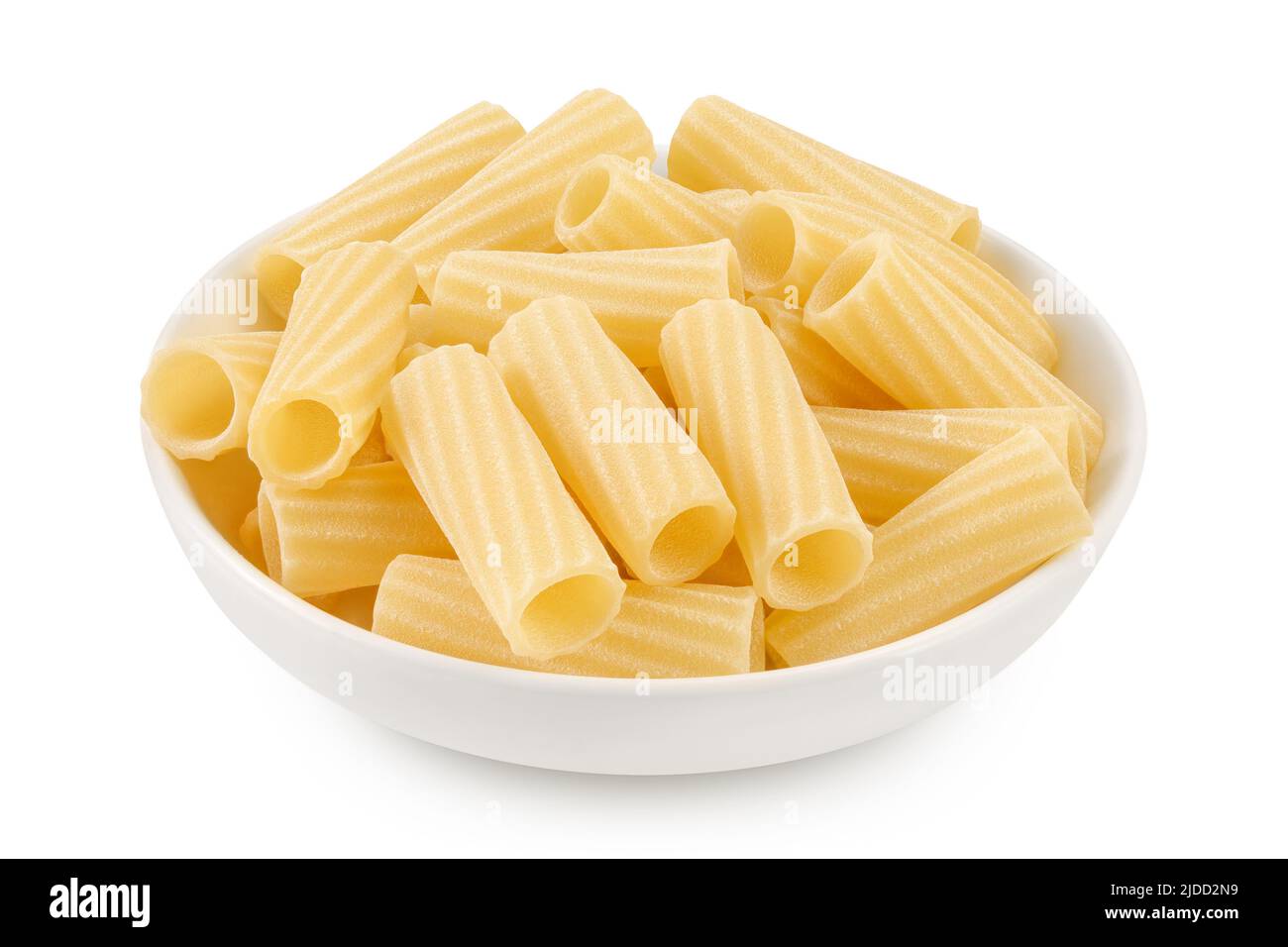 raw italian tortiglioni pasta in ceramic bowl isolated on white ...