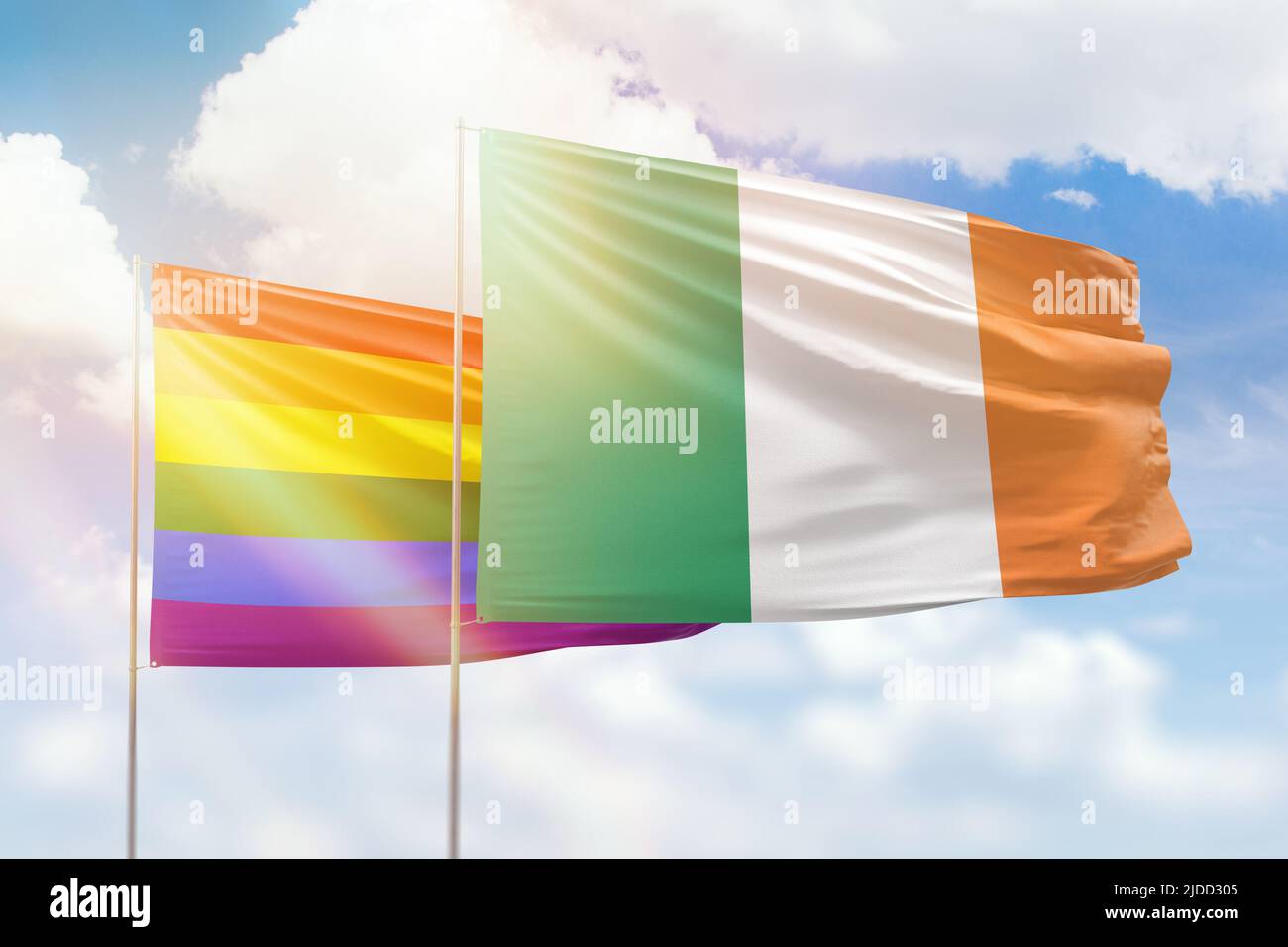 Sunny blue sky and flags of lgbt and ireland Stock Photo - Alamy