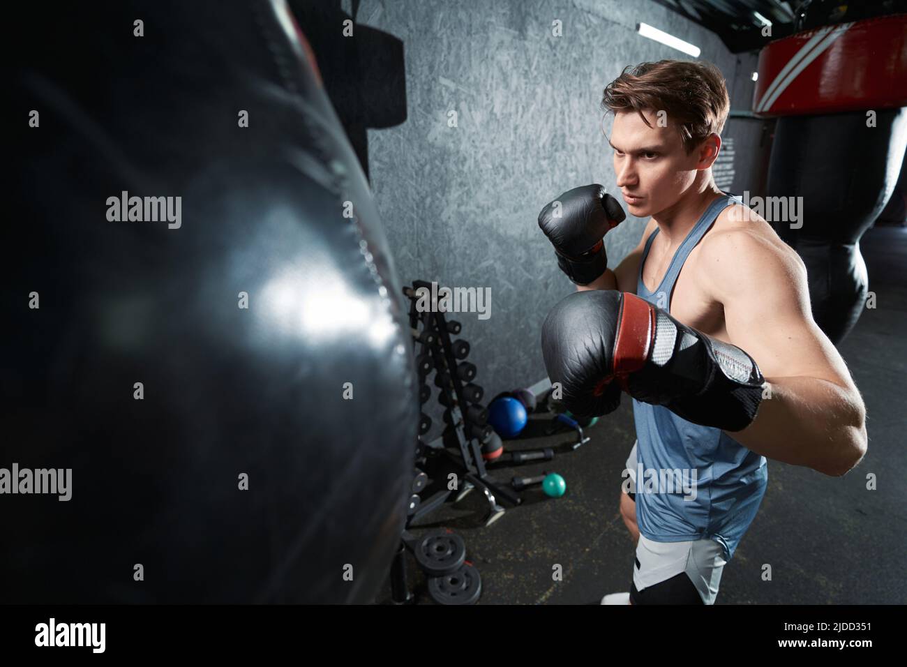 Male boxer throwing punch hi-res stock photography and images - Alamy