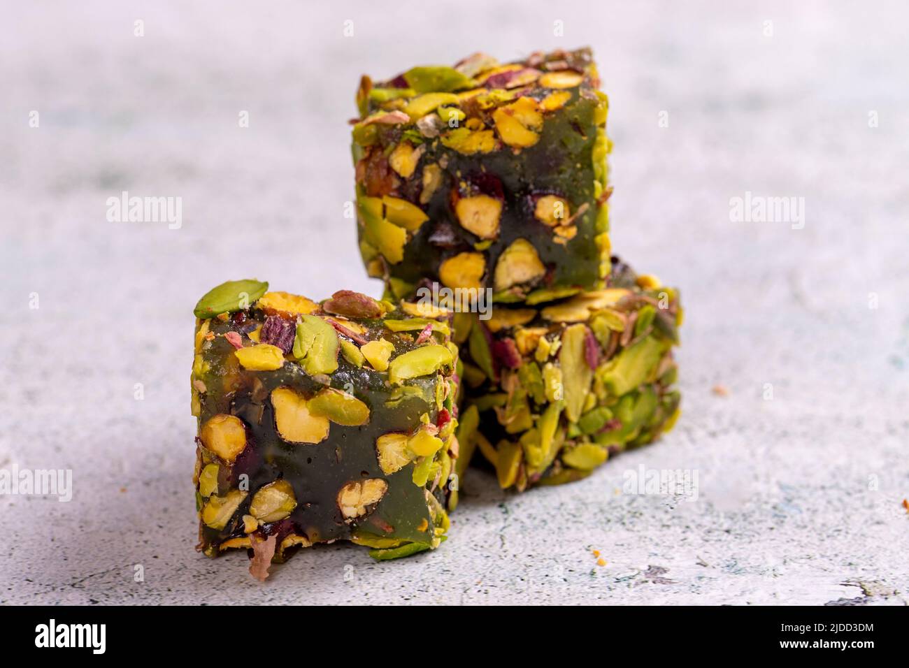Turkish Delight with Pistachio on a stone background. Traditional ...