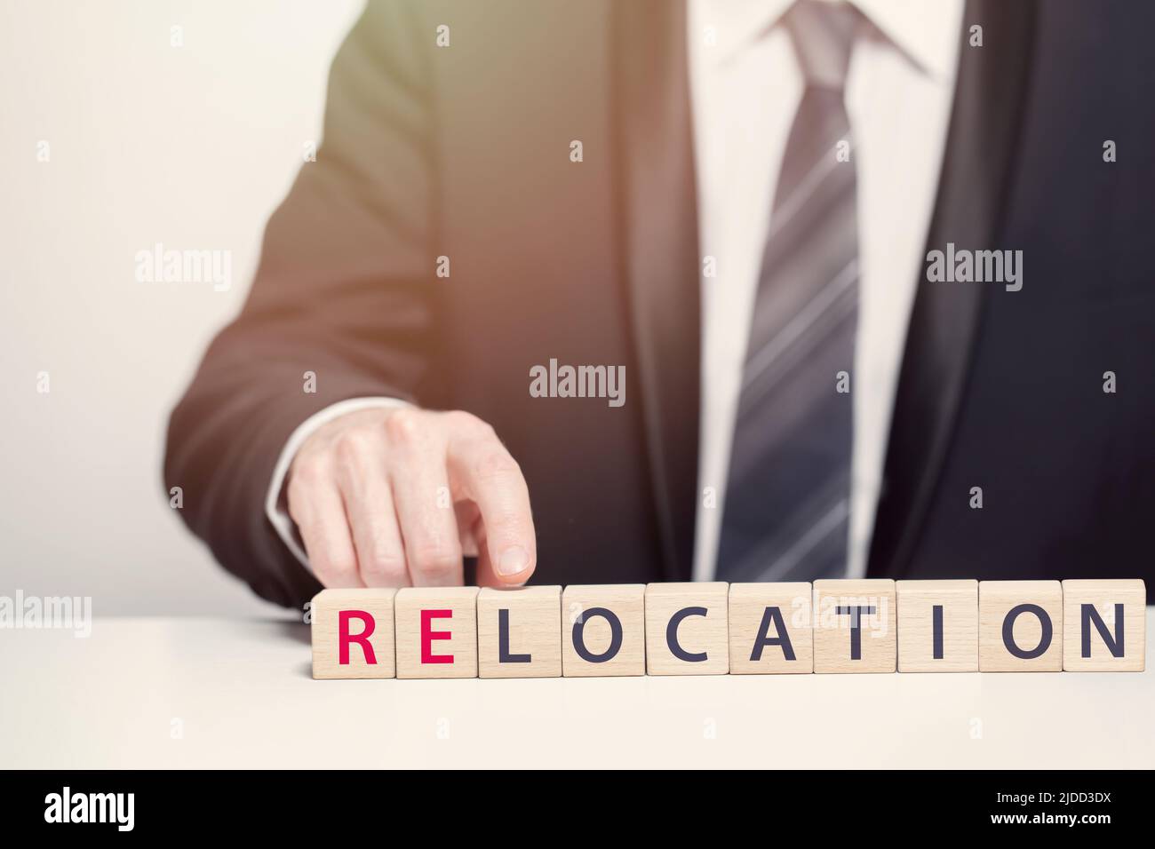 Relocation concept. Man pointing at relocation inscription Stock Photo ...