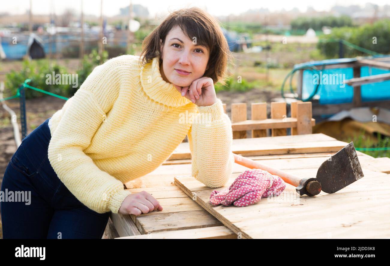 Thoughtful gardener hi-res stock photography and images - Alamy