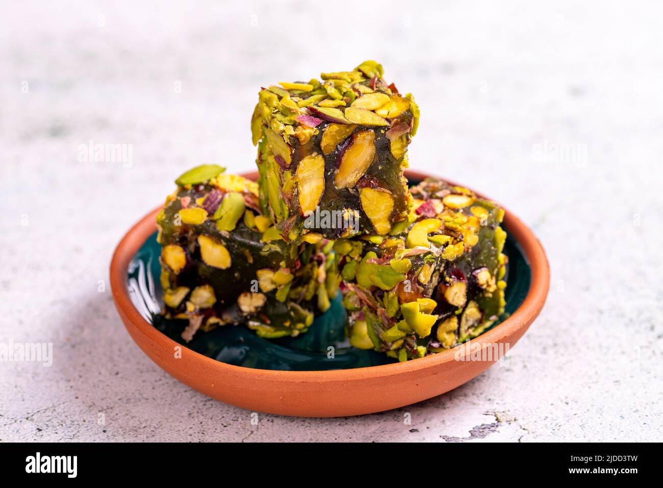 Turkish Delight with Pistachio on a stone background. Traditional ...