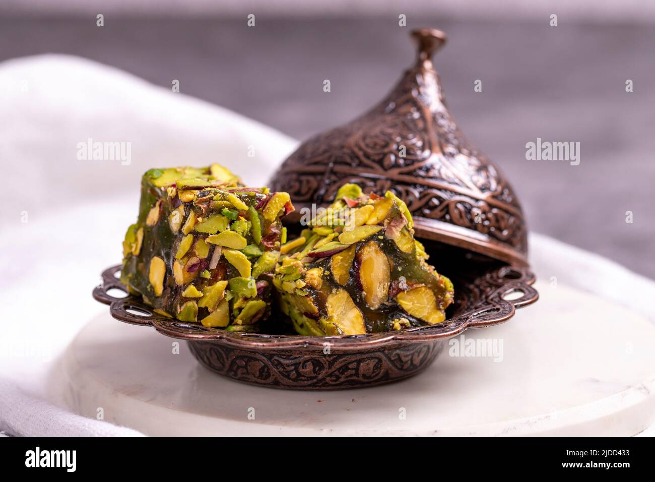 Turkish Delight with Pistachio on a dark background. Traditional ...