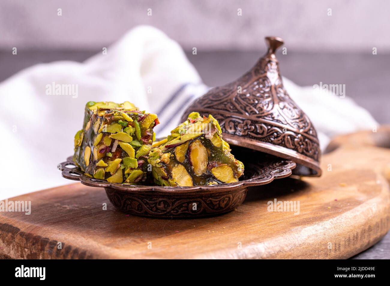 Turkish Delight with Pistachio on a dark background. Traditional ...