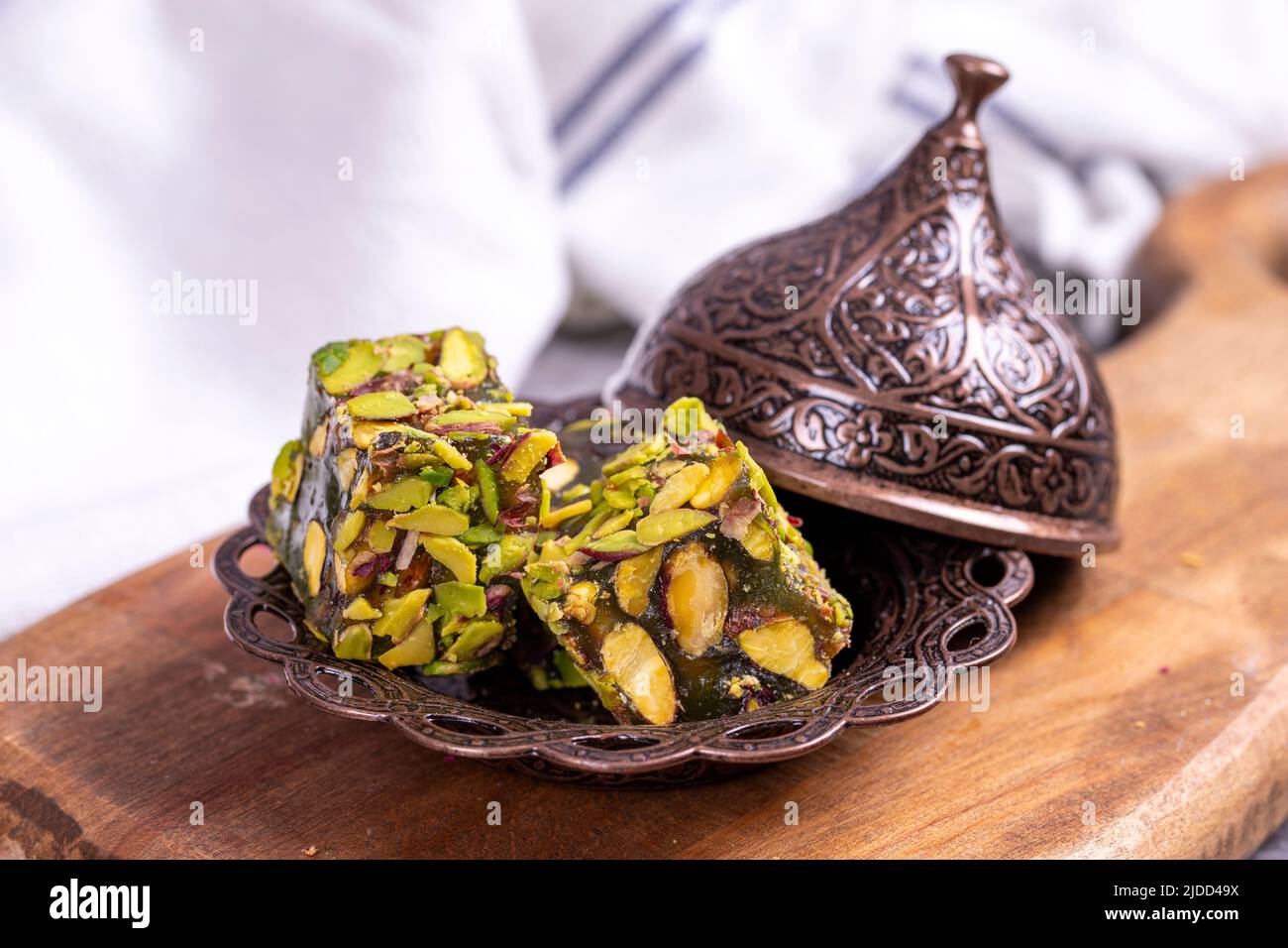 Turkish Delight with Pistachio on a dark background. Traditional ...