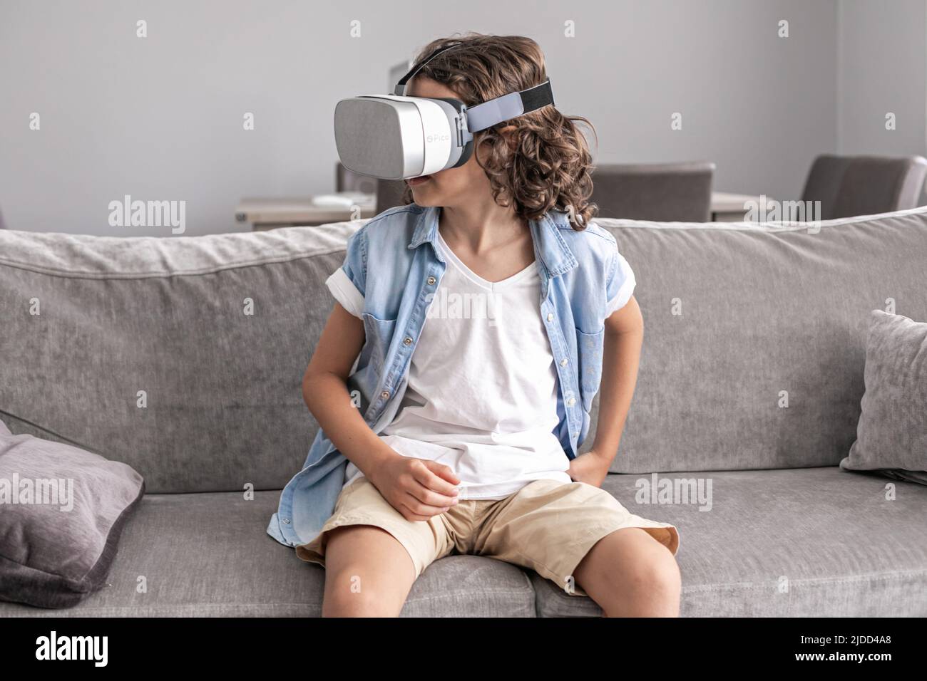 happy little boy child using virtual reality headset vr glasses ...
