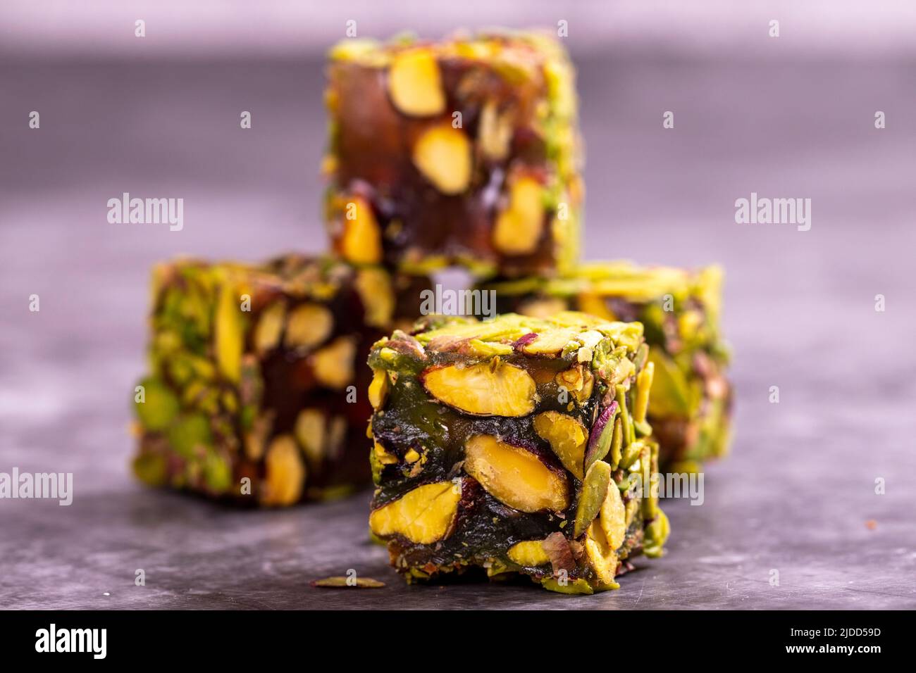 Turkish Delight with Pistachio on a dark background. Traditional ...