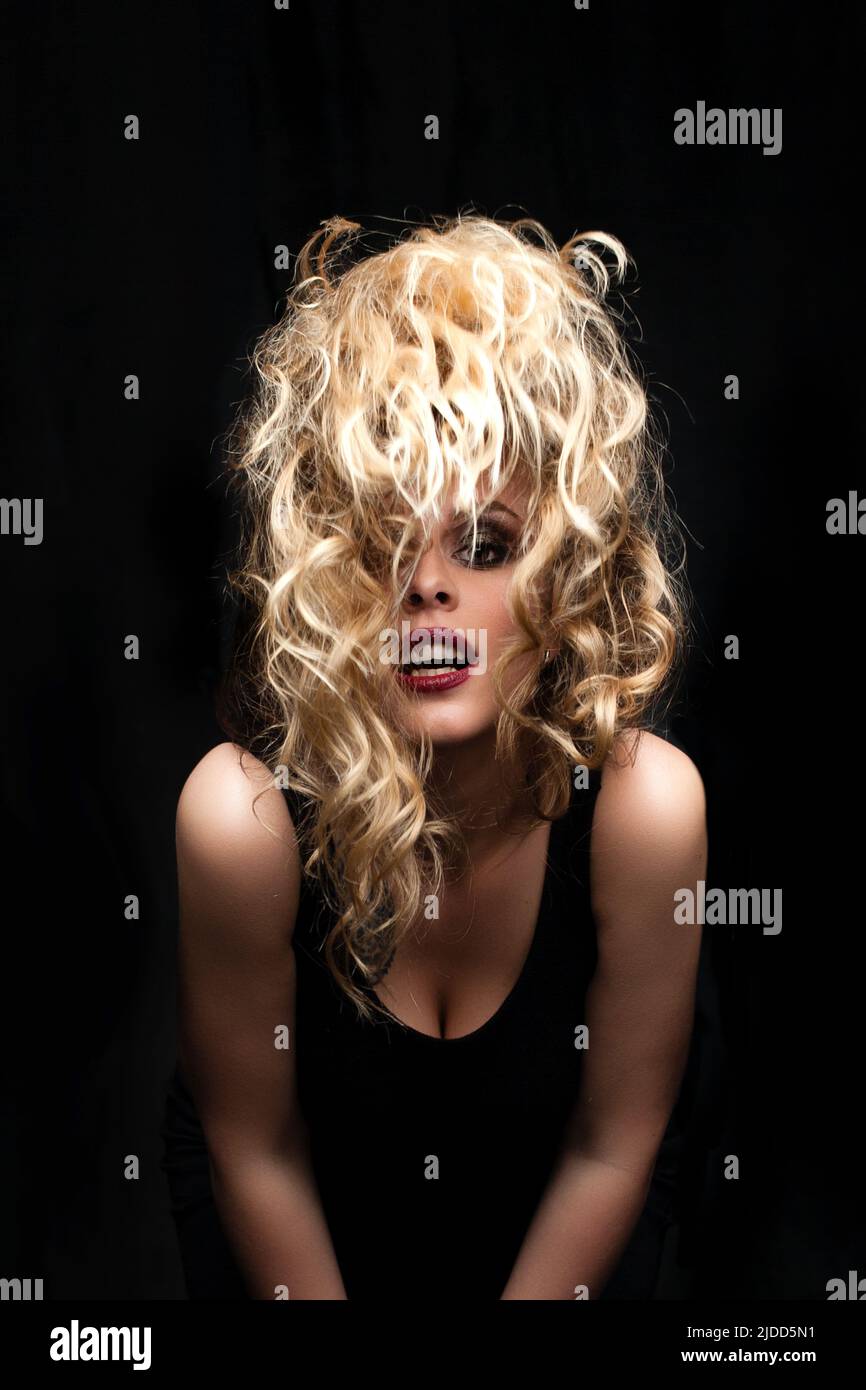 Strong wind blowing woman hi-res stock photography and images - Alamy