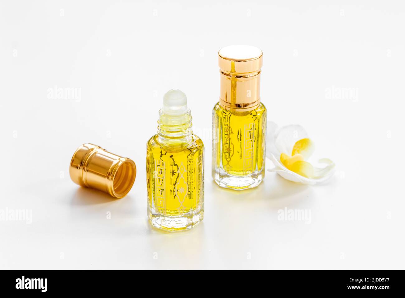Bottles of agarwood tree oil perfume, close up. Traditional Arabian ...