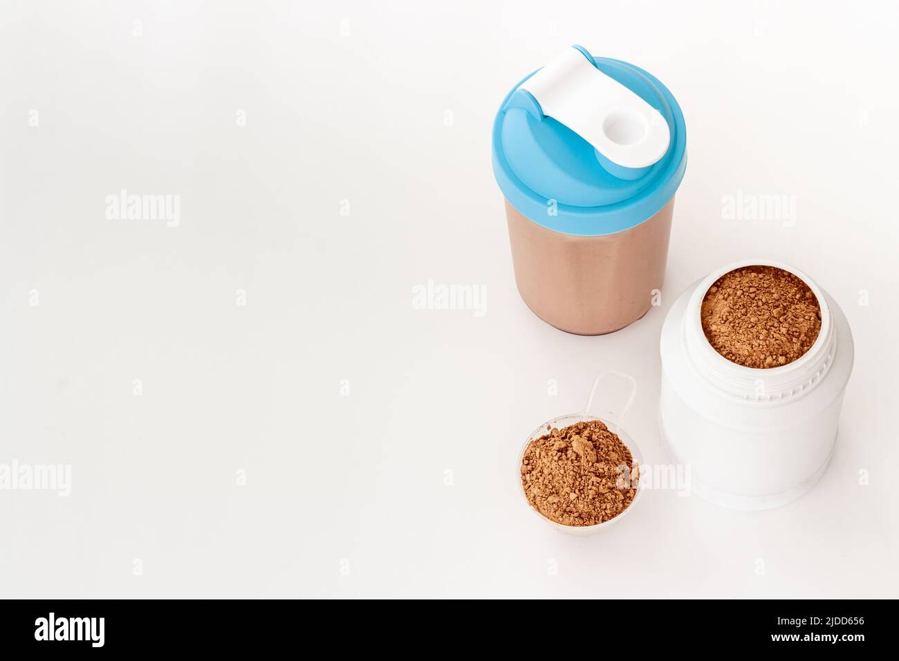 Food supplement for training - whey protein in jar and shaker Stock ...