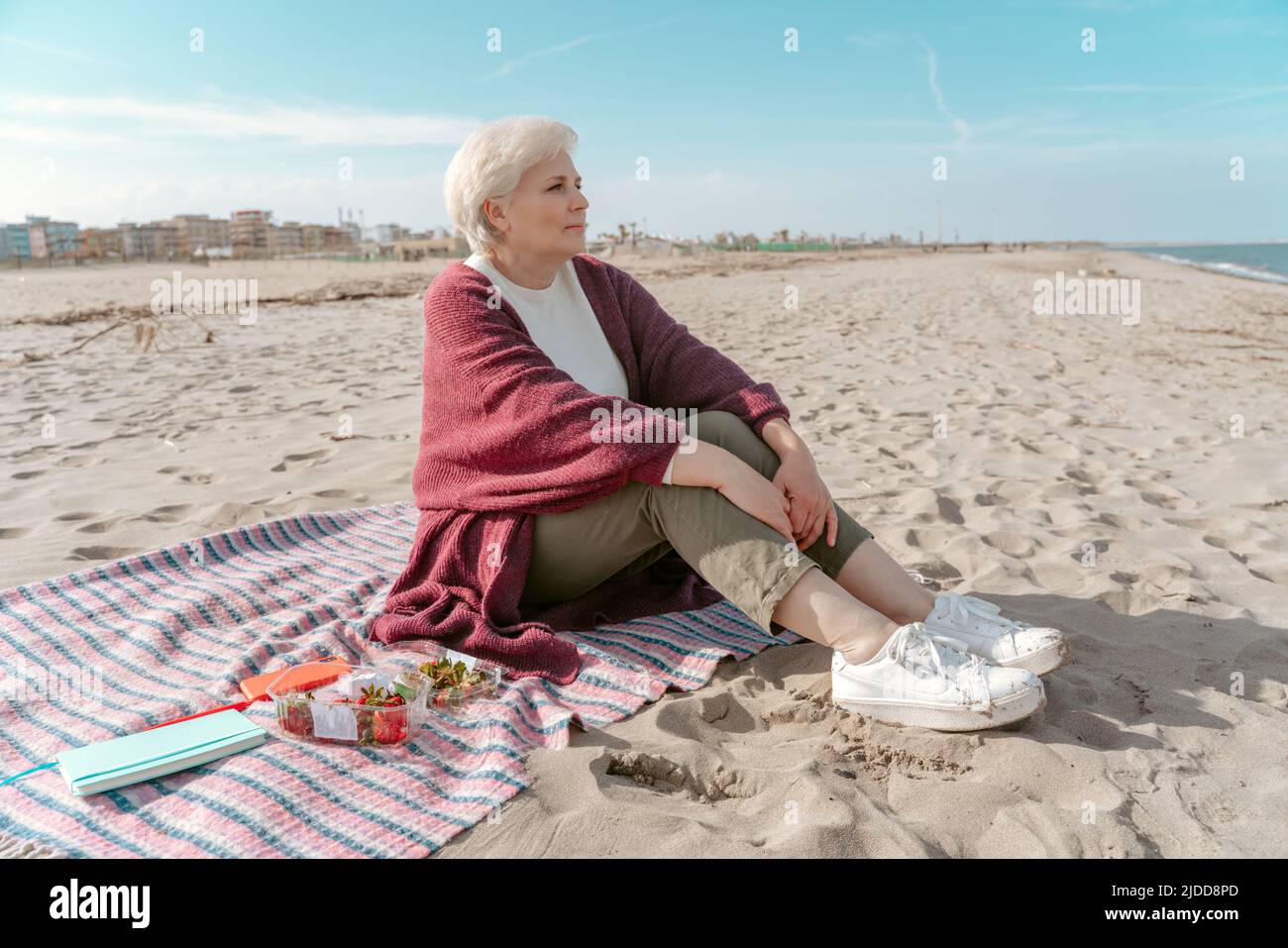 Attractive sitting seated hi-res stock photography and images - Alamy