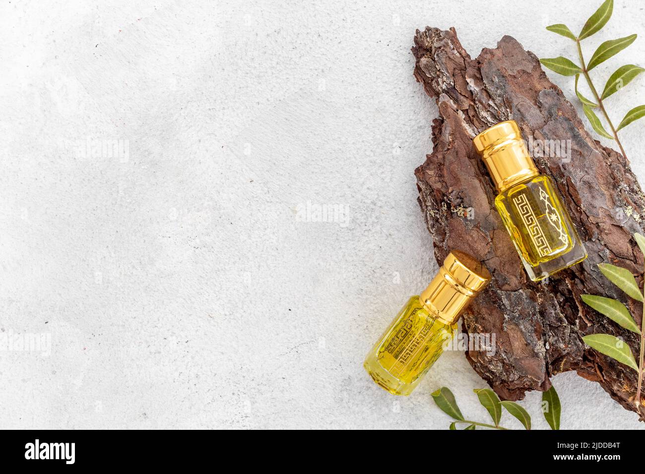 Arabian oud attar oil - perfume in glass bottles. Overhead view Stock ...