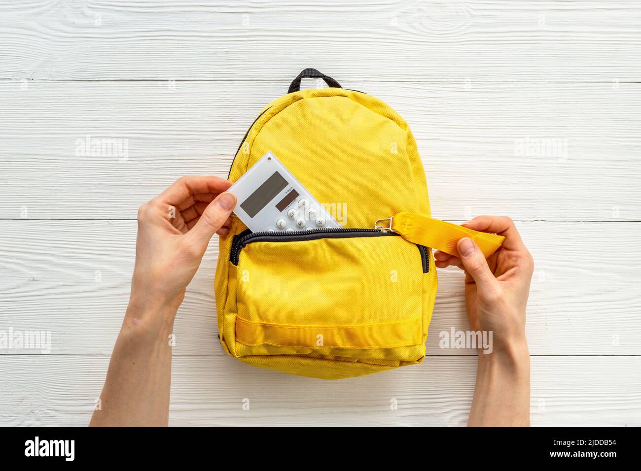School backpack with school items and students equipment, top view ...