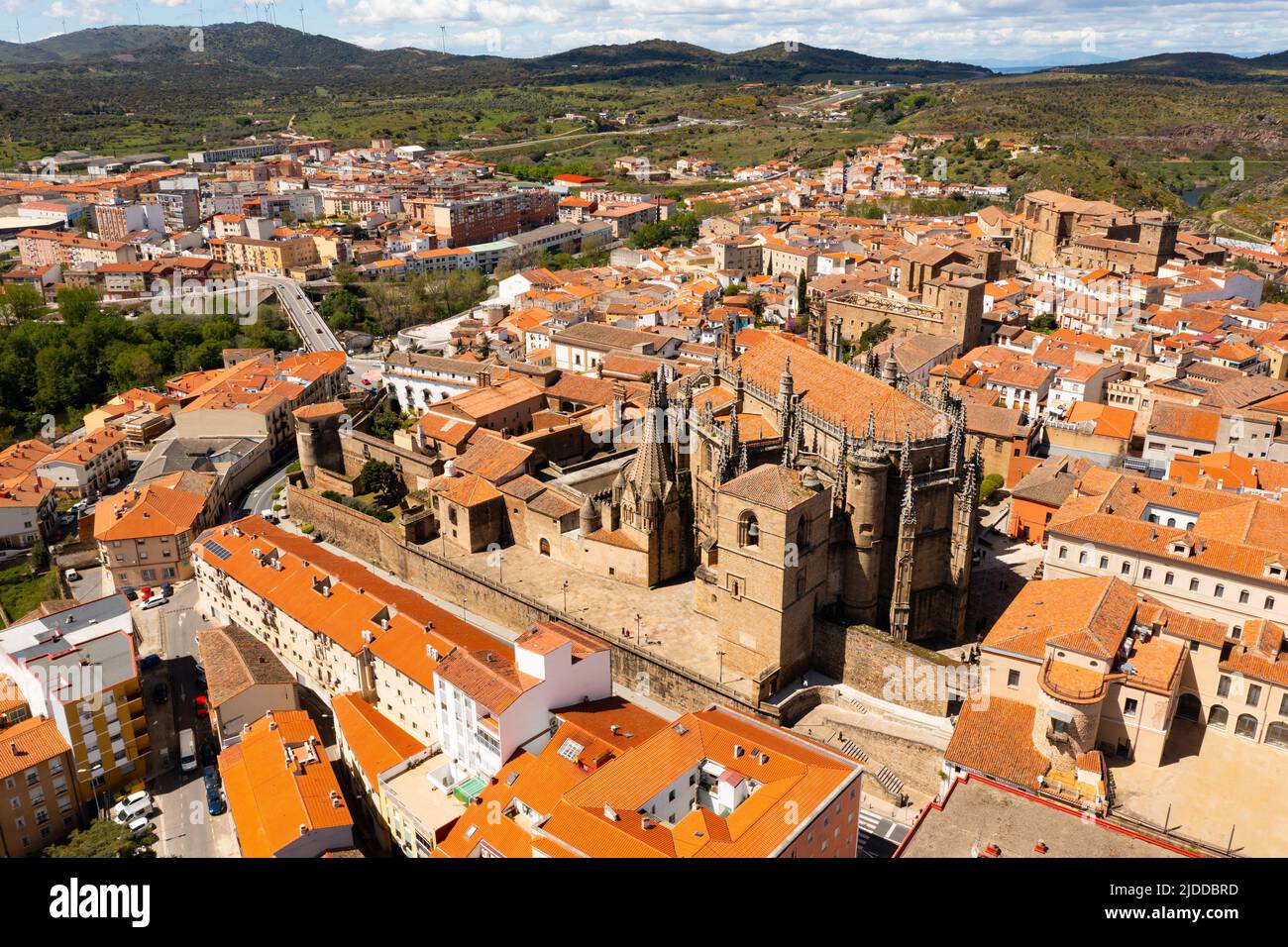 Bird's eye view of residential buildings and cathedral in Plasencia ...