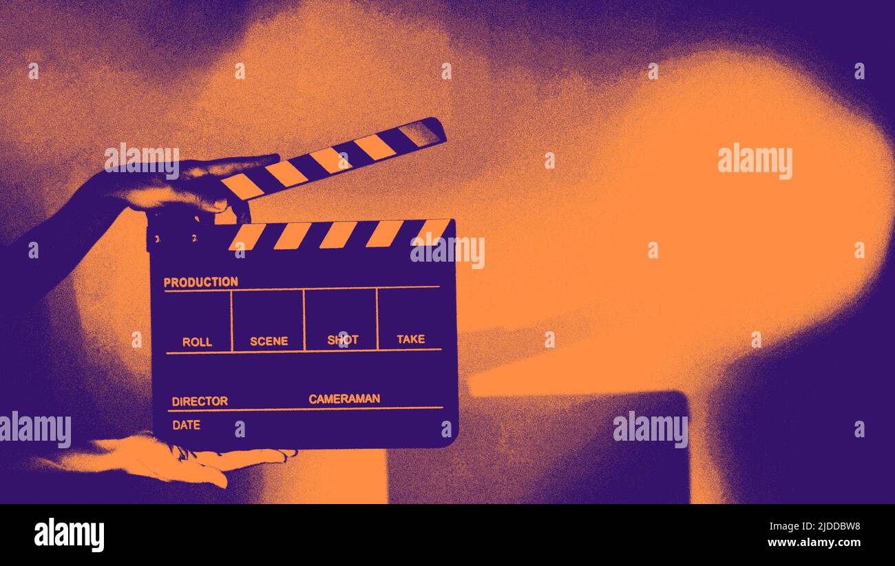 Movie Clapper board. Crew hand holding plastic and wooden film slate ...