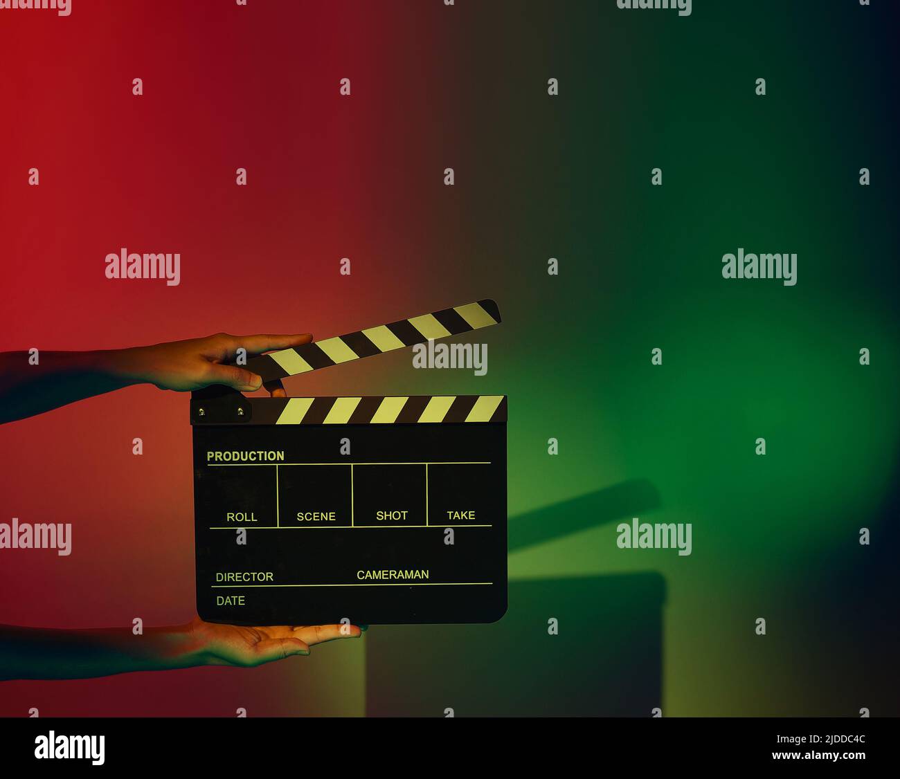 Movie Clapper board. Crew hand holding plastic and wooden film slate ...