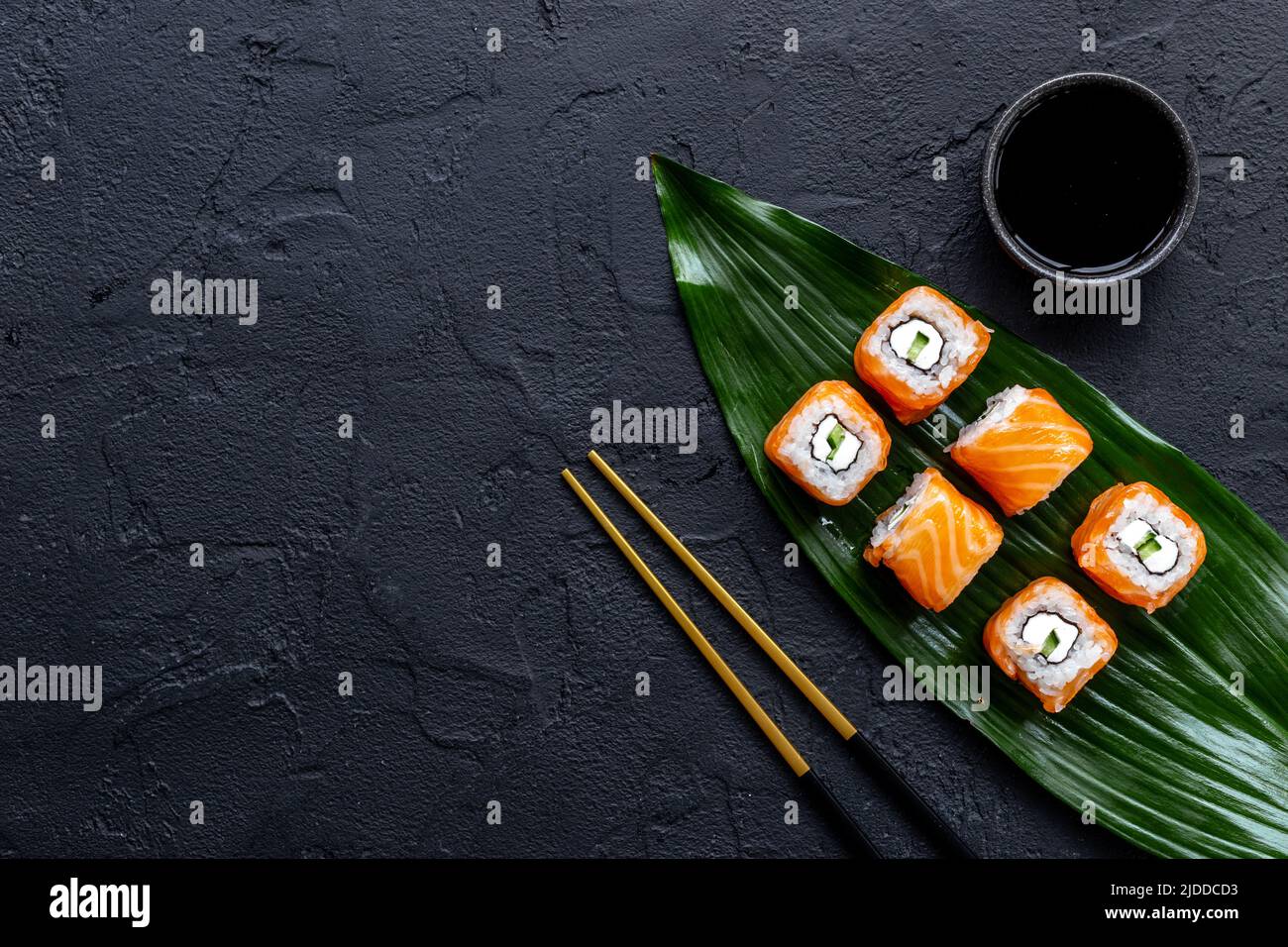 Sushi roll set eco served on green Bamboo leave, top view Stock Photo ...