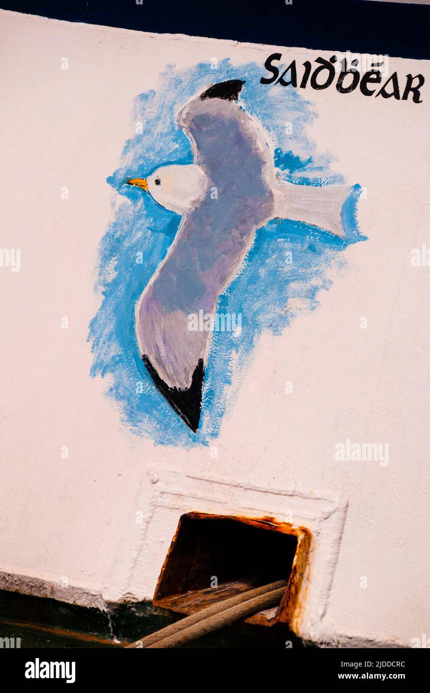 Painted boat hull in Kilronan Harbor, Inishmore, Aran Islands, Ireland ...