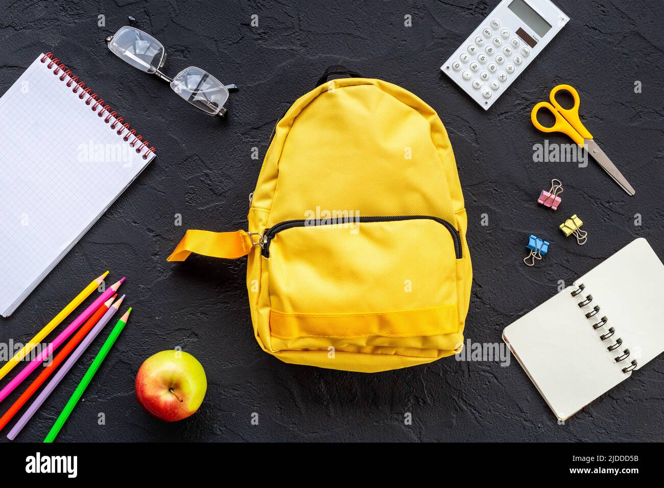 Flat lay of school backpack with school items and student accessories ...