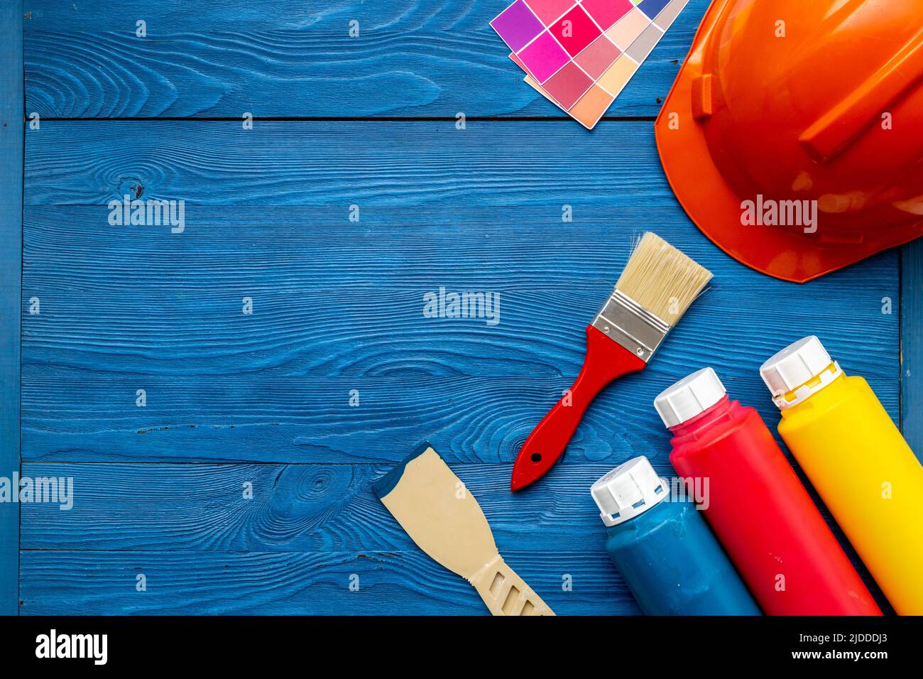 House renovation and painting background with construction helmet and ...