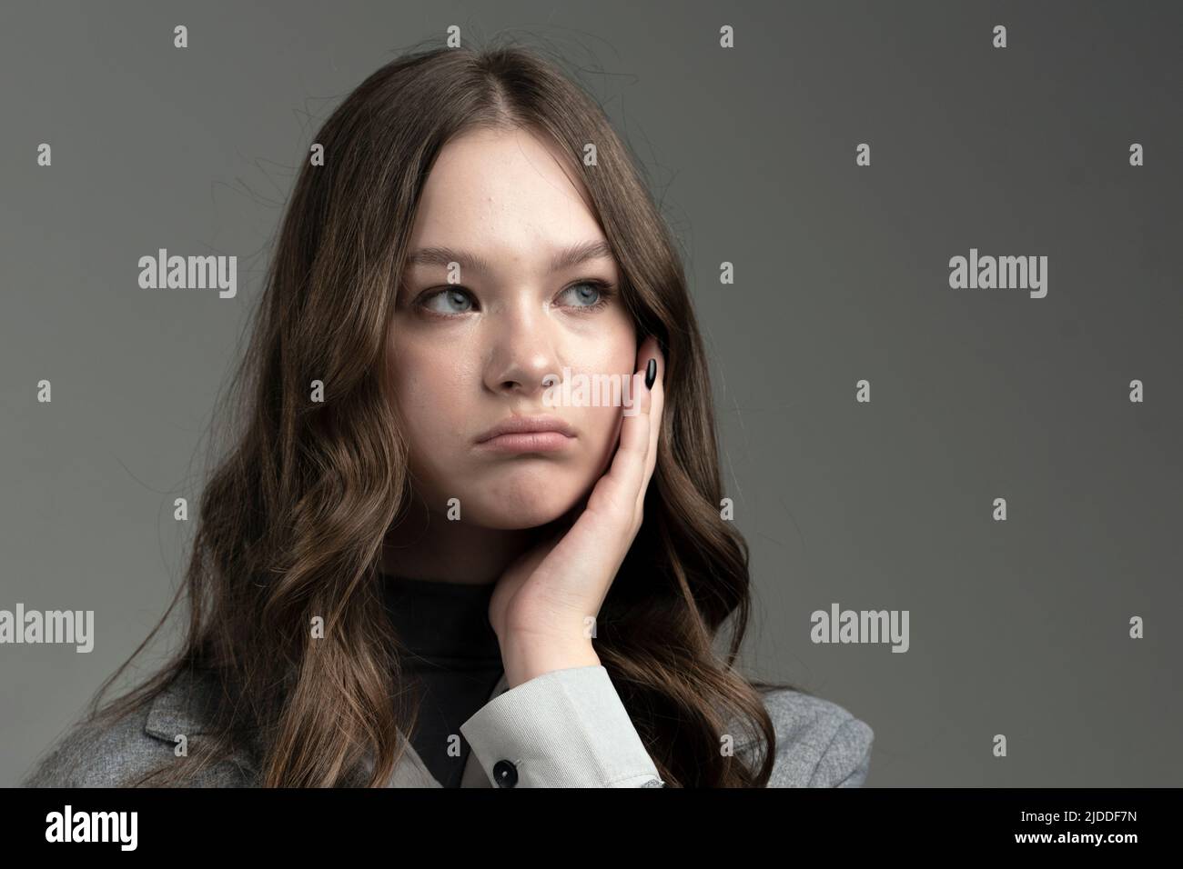 Russia Krasnoyarsk, 06 yanuary 2021: sad face of a European young girl ...