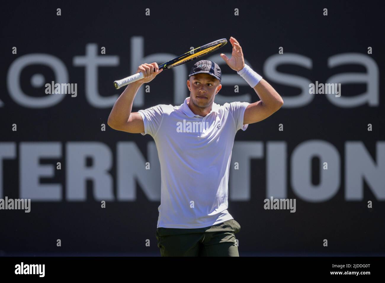 Jay Clarke of Great Britain holding his racket above his head during ...