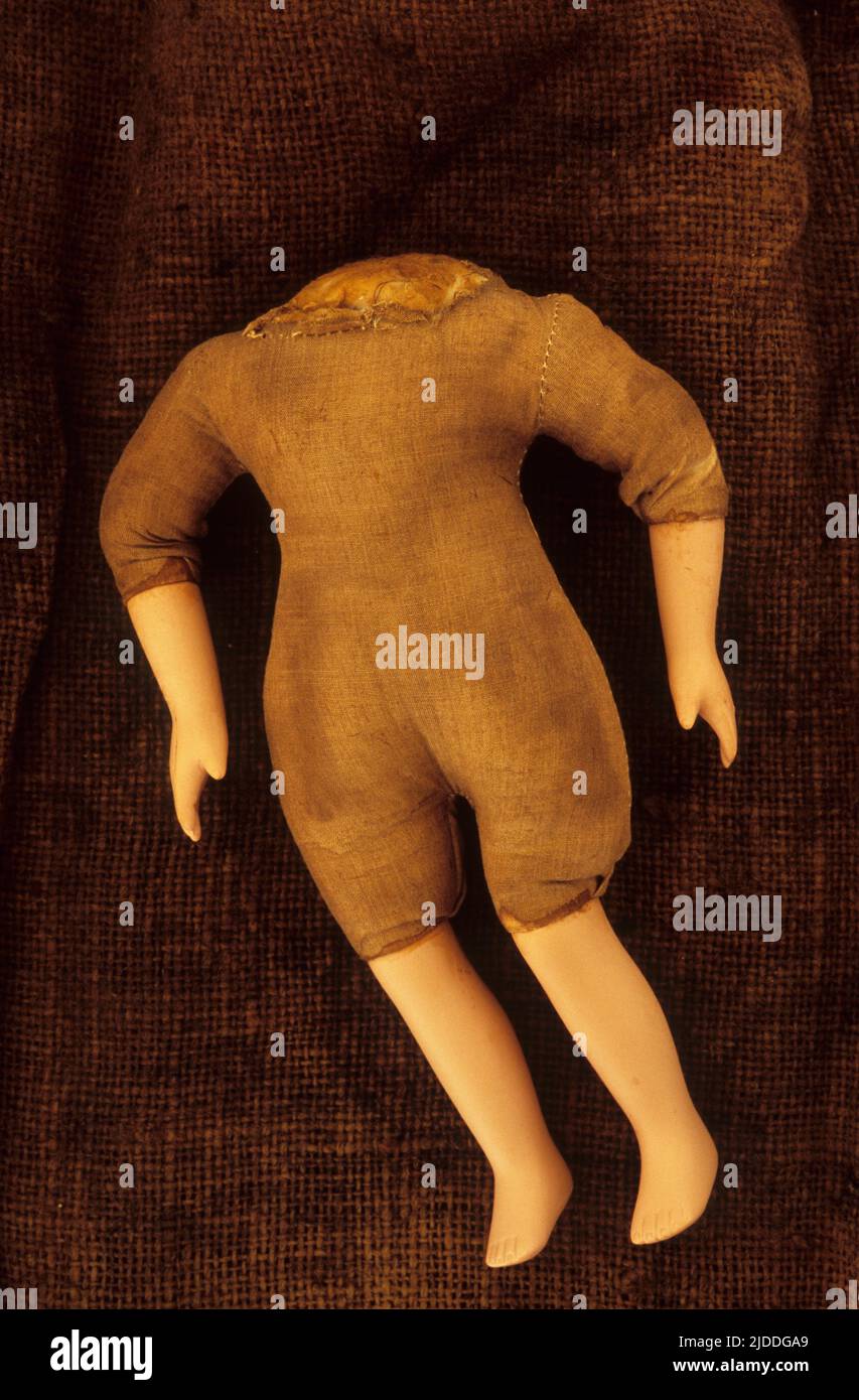 Headless body of doll Stock Photo - Alamy