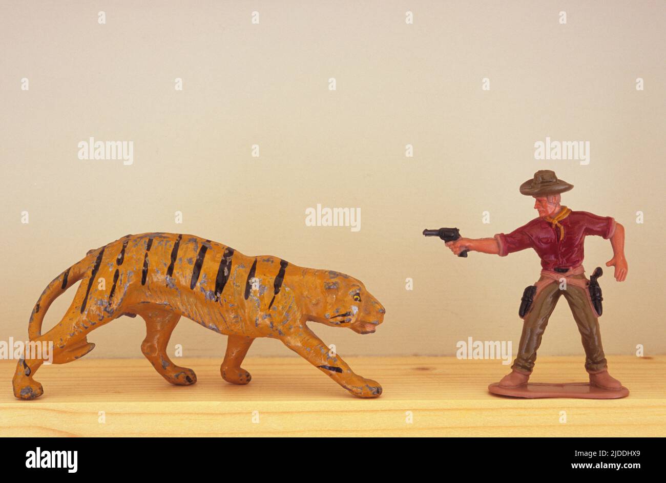 Model tiger and cowboy Stock Photo - Alamy